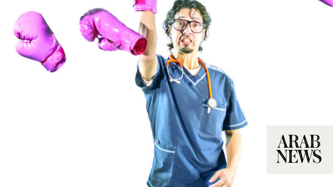 Pink boxing gloves to fight cancer | Arab News