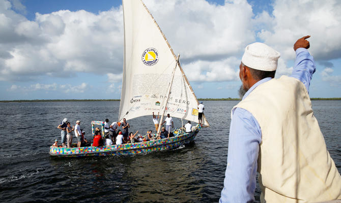 Islanders in Kenya build recycled plastic boat to highlight pollution ...