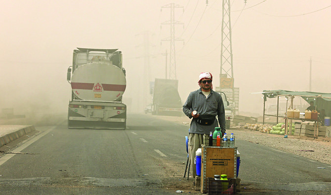 Weathering sandstorms, Iraqis grit teeth and battle on | Arab News