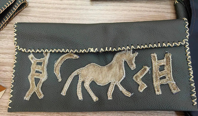 Saudi women taught traditional skills for making leather goods | Arab News